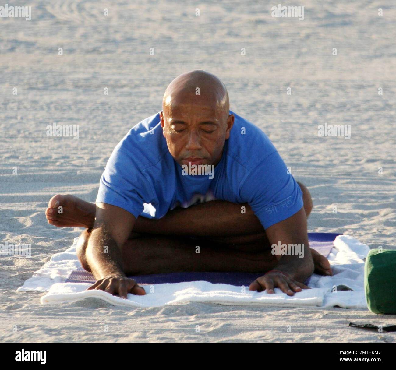 Hip Hop Mogul Russell Simmons does yoga class on Miami Beach with his ...