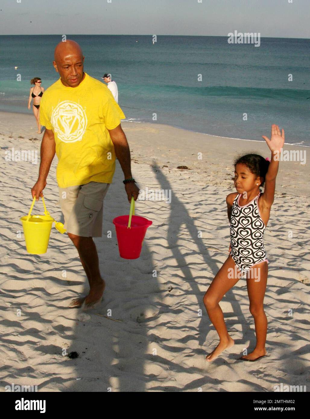 Hip Hop Mogul Russell Simmons takes daughters Ming Lee and Aoki Lee ...