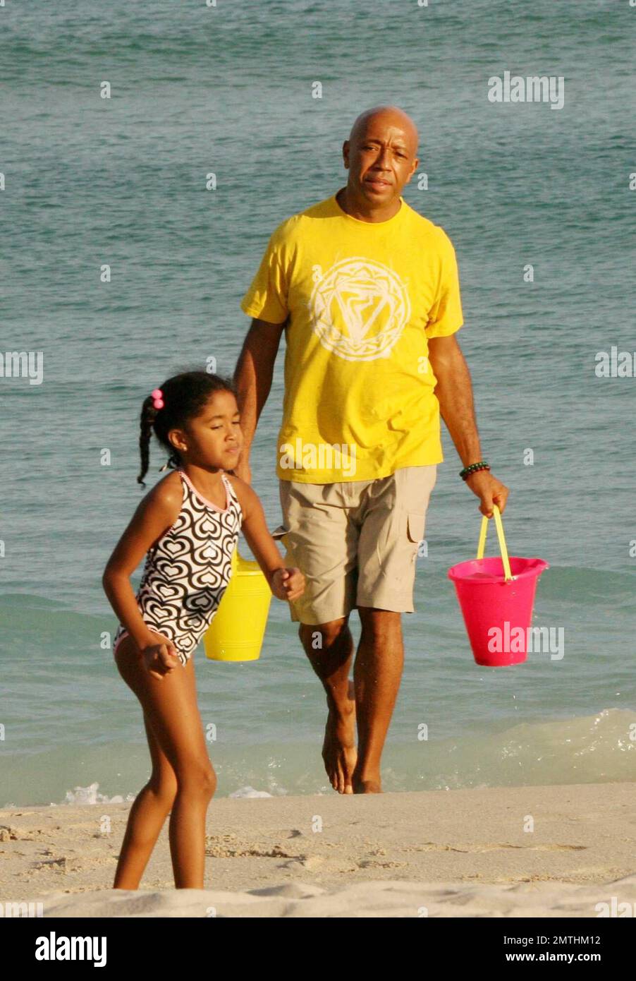 Hip Hop Mogul Russell Simmons takes daughters Ming Lee and Aoki Lee ...