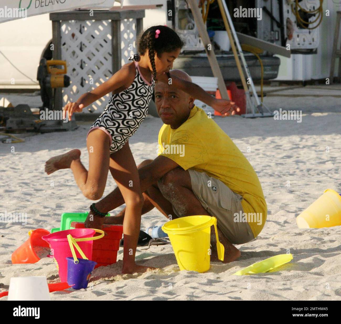 Hip Hop Mogul Russell Simmons takes daughters Ming Lee and Aoki Lee ...