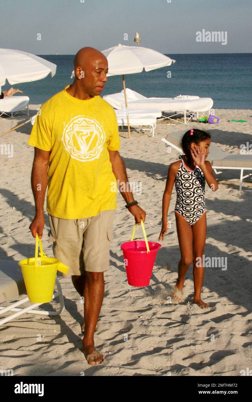 Hip Hop Mogul Russell Simmons Takes Daughters Ming Lee And Aoki Lee