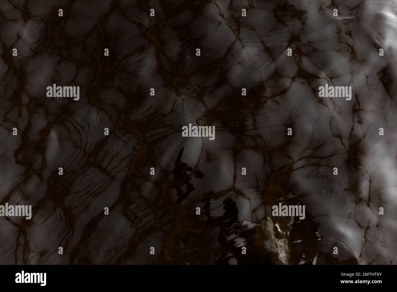 The texture of the water. An abstract photograph of light and shadow ...