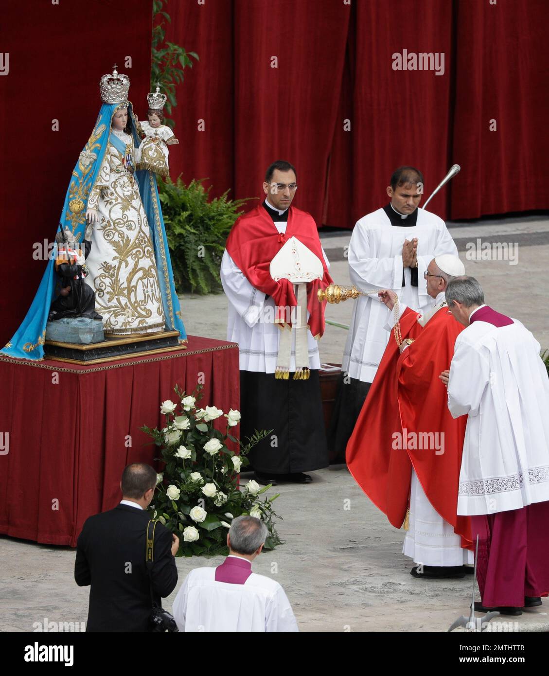 Pope Francis asperses incense as he presides over Mass for the ...