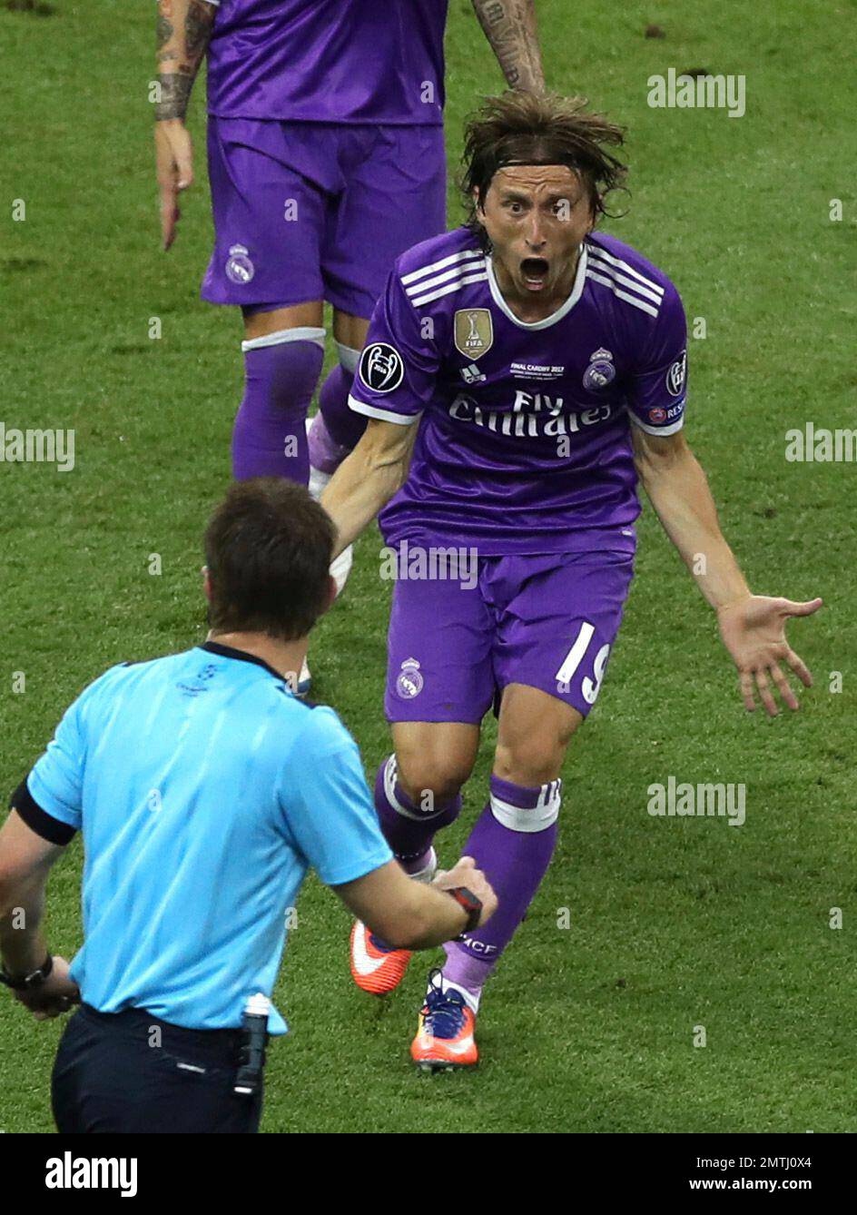 Real Madrid's Luka Modric reacts to the referee Felix Brych during the ...