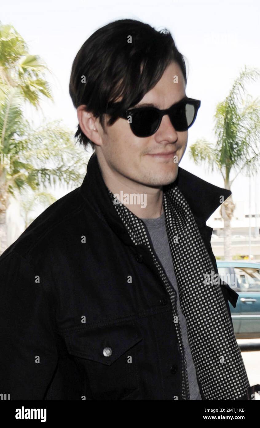 Maleficent star, Sam Riley arriving at LAX airport in Los Angeles, CA ...