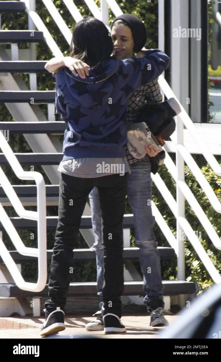 DJ Samantha Ronson hugs a girlfriend after waiting for her outside Fred ...