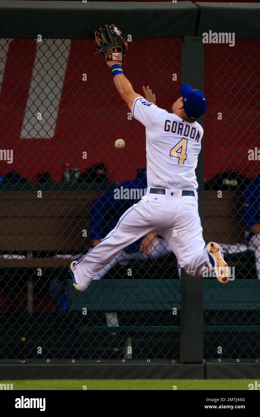 Kansas City Royals left fielder Alex Gordon chases a double hit by ...
