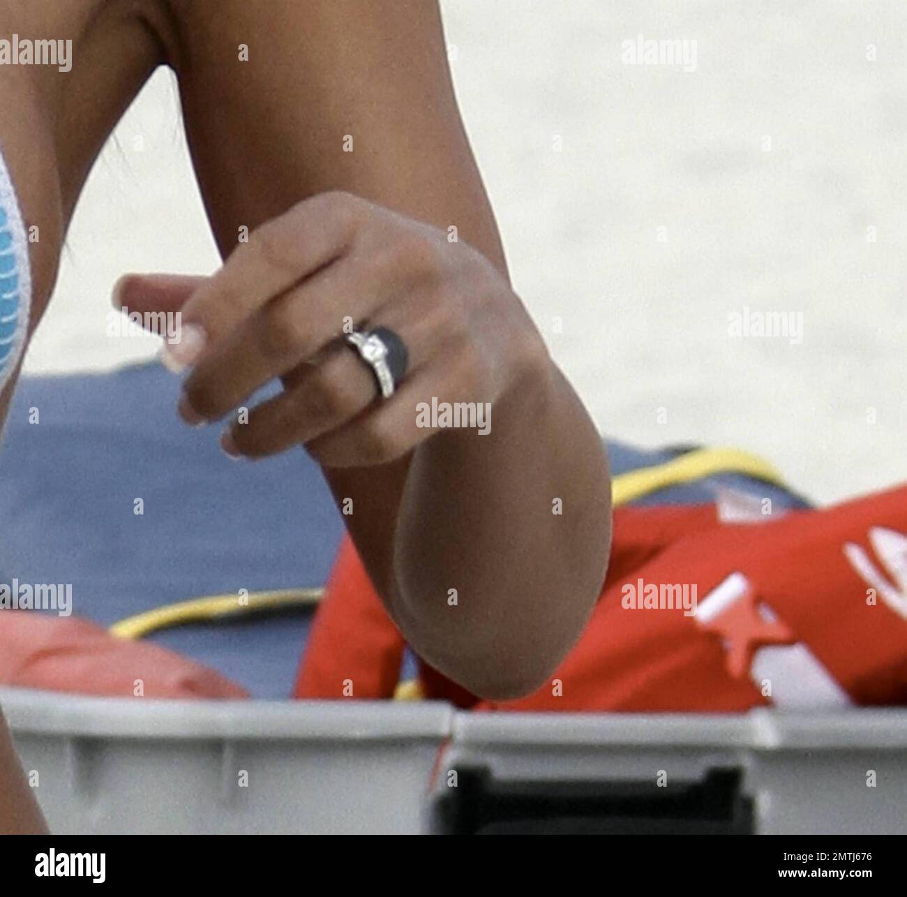 Shauna Sand gets a massage on the beach while her new husband Laurent ...