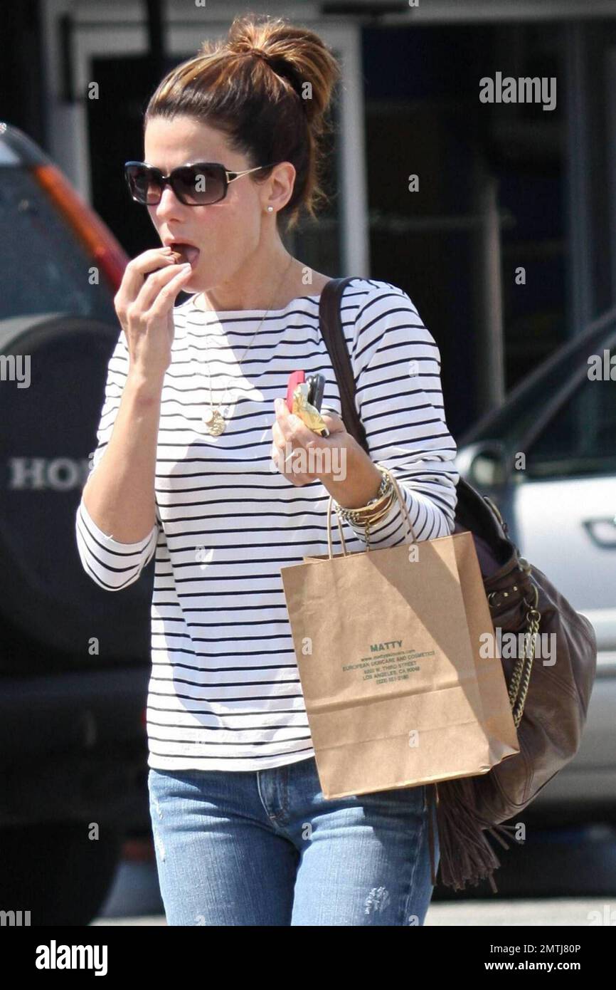 Exclusive!! Sandra Bullock aleaves Matty European Skin Care eating what ...