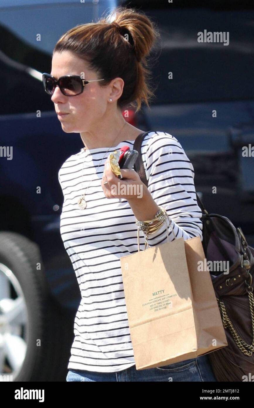 Exclusive!! Sandra Bullock aleaves Matty European Skin Care eating what ...