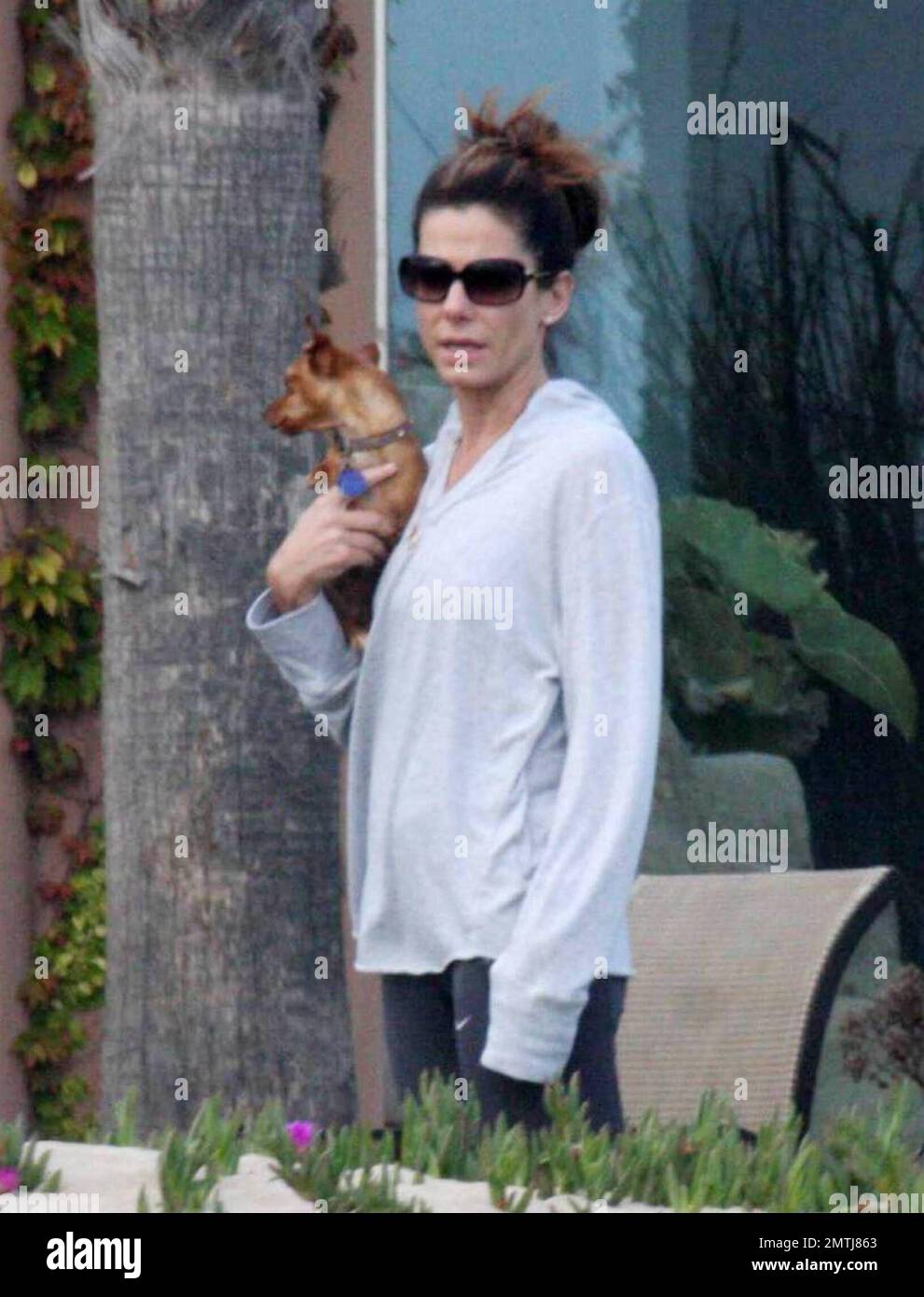 Exclusive!! Sandra Bullock spends a day at her beach house with her two ...