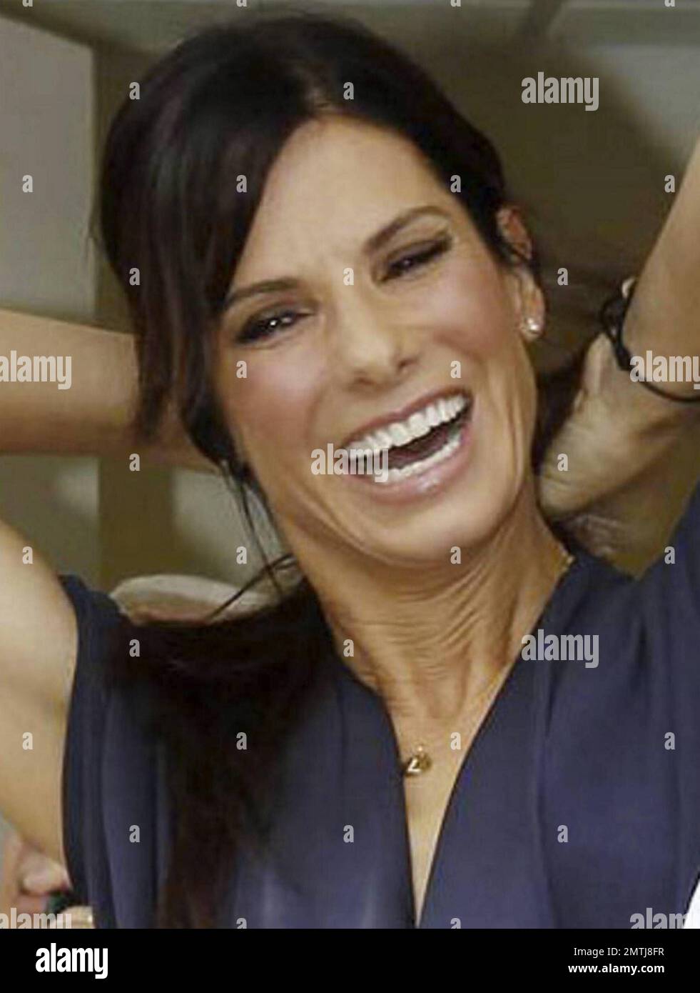 Actress Sandra Bullock smiles during a ribbon-cutting ceremony opening ...