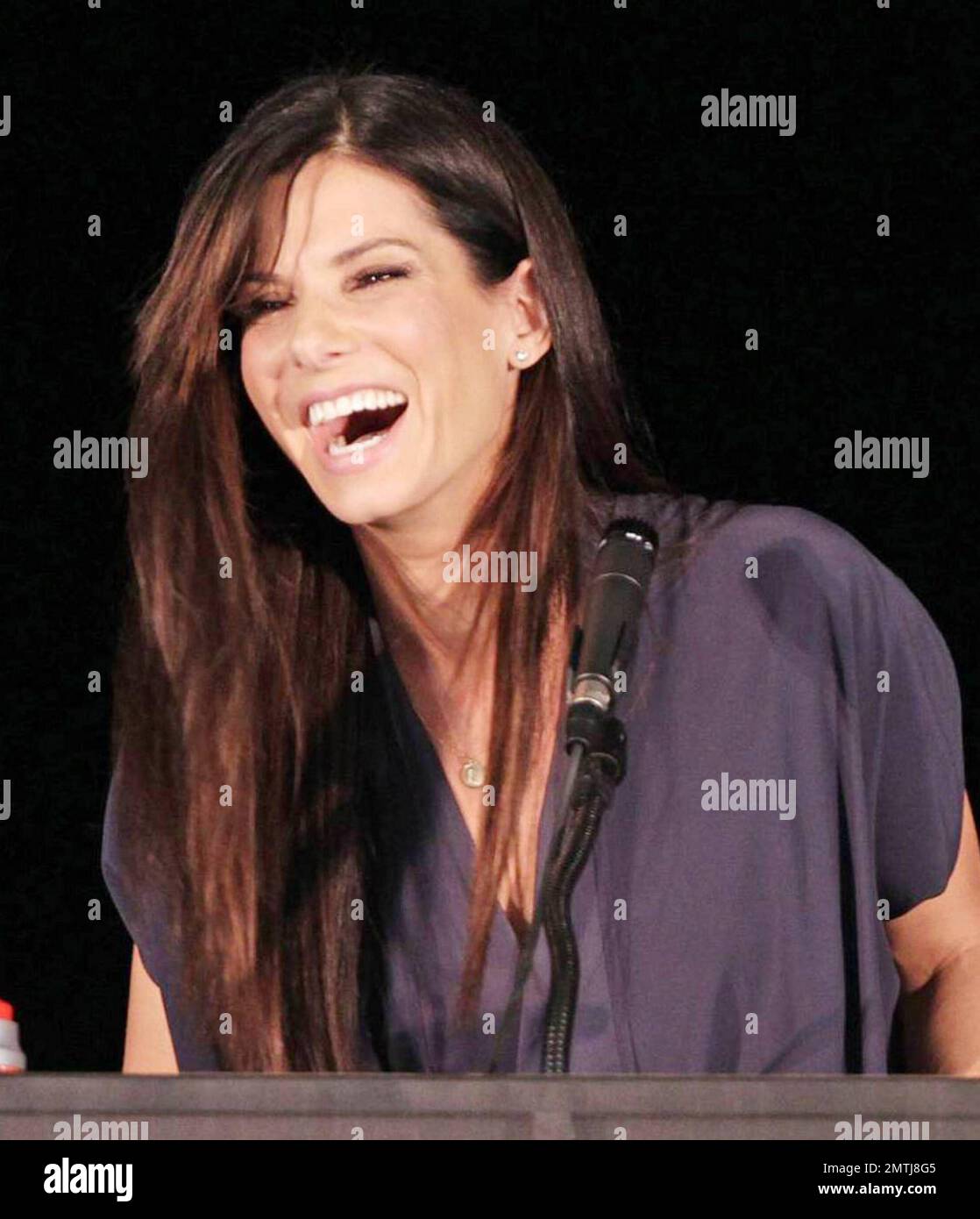 Actress Sandra Bullock smiles during a ribbon-cutting ceremony opening ...