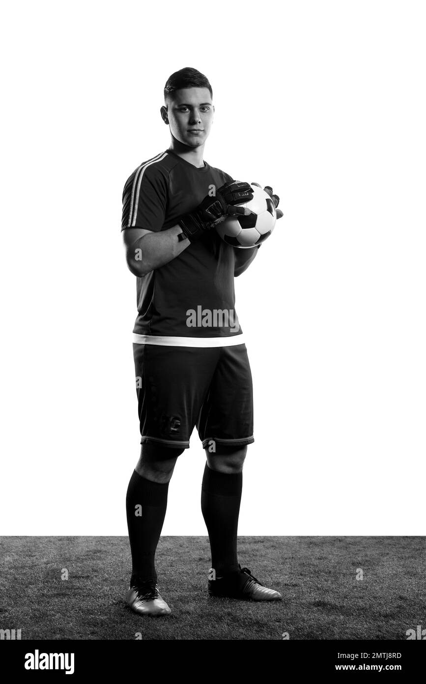 Black and white portrait of male soccer football goalkeeper psoing ...