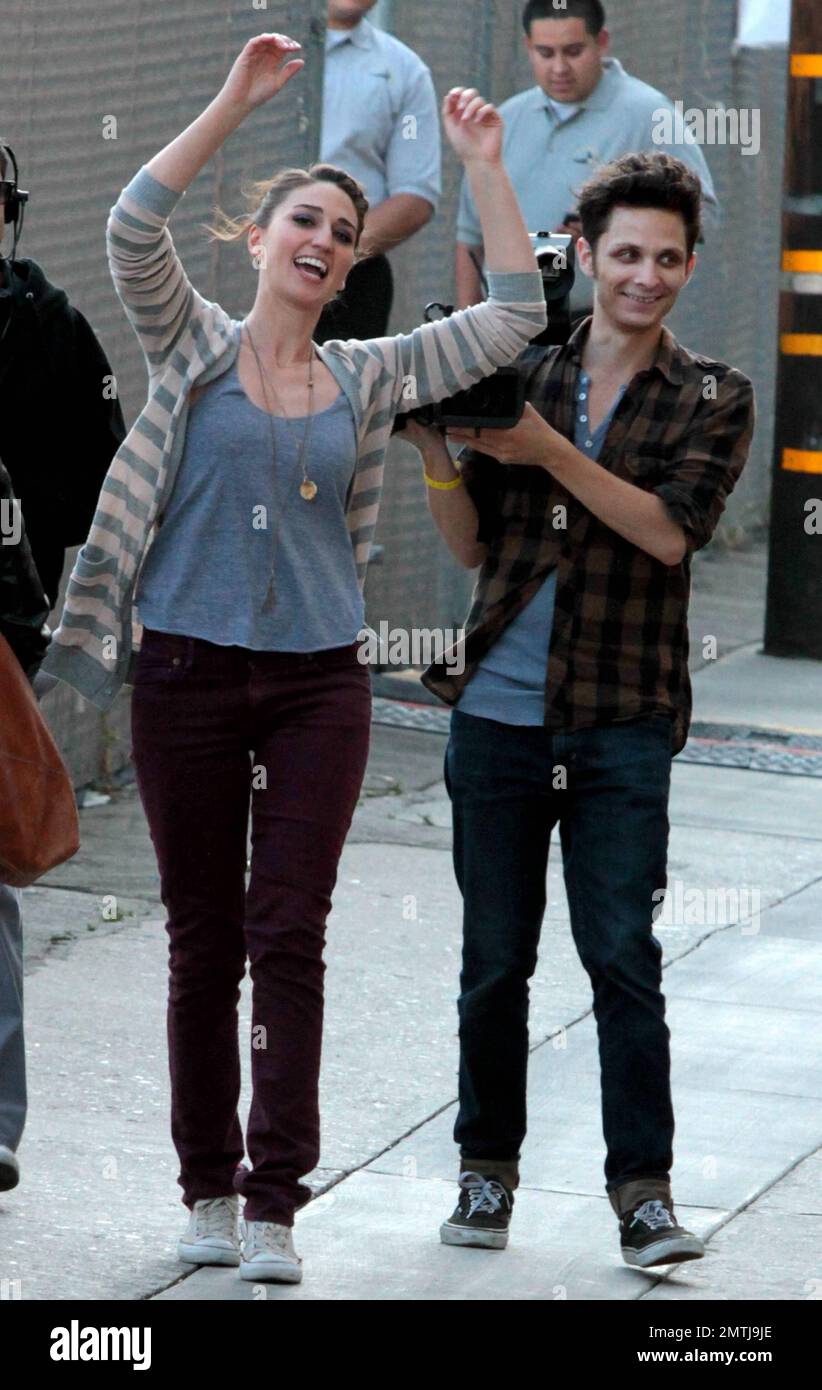 Singer Sara Bareilles waves and cheers back at her cheering fans after ...