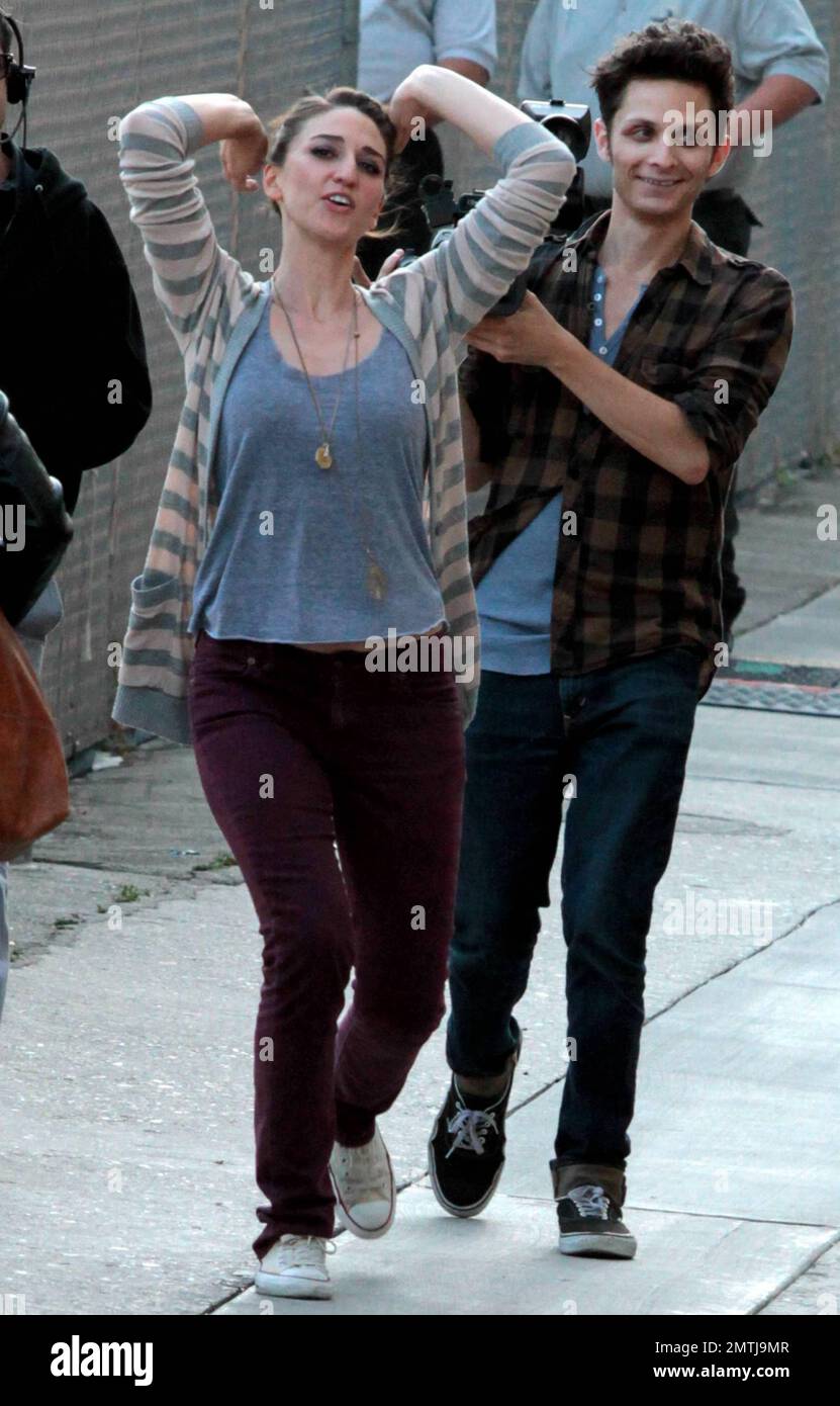 Singer Sara Bareilles waves and cheers back at her cheering fans after ...