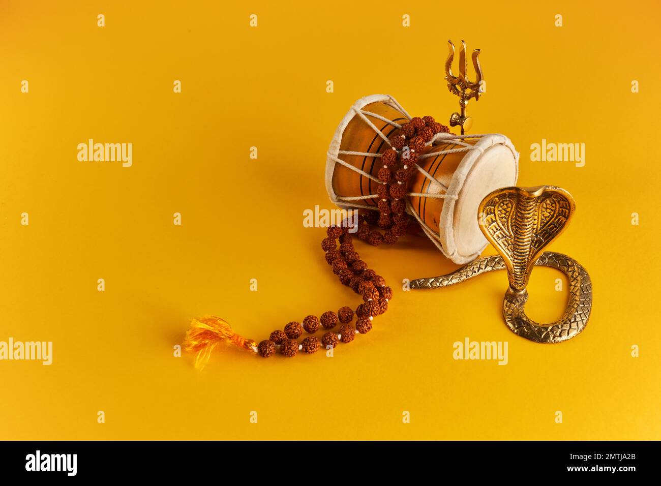 Shivaratri background with Shivas trident, Pellet Drum Damroo musical ...