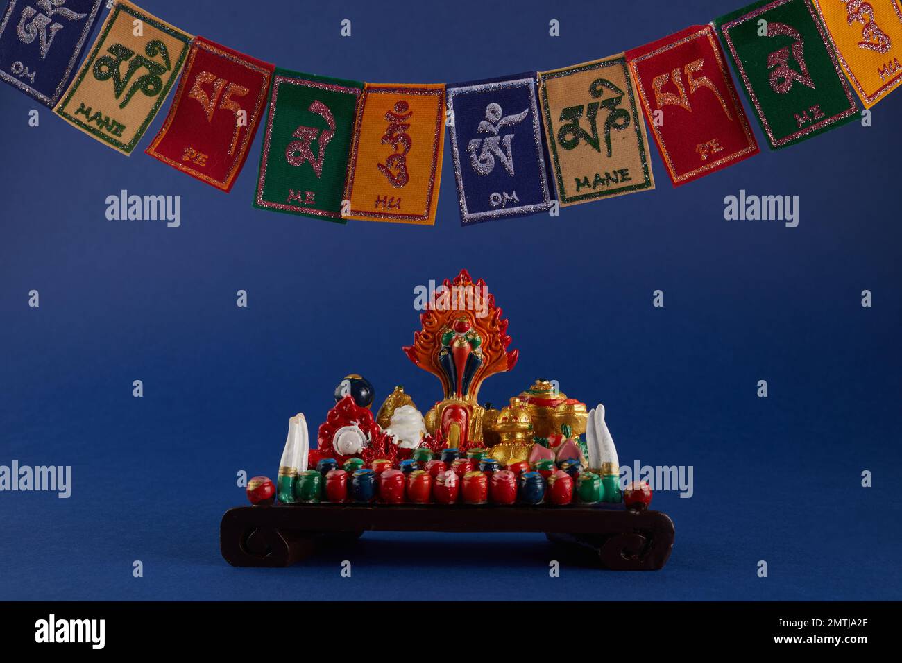Happy Losar, Tibetan New Year background. Text on flags Om mani padme ...