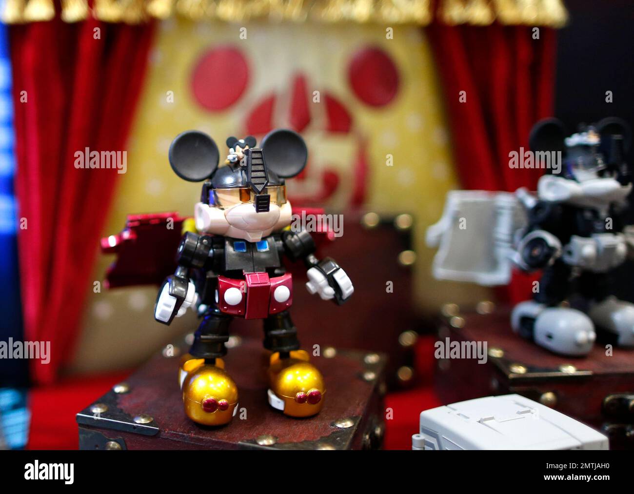 A Transformer figure depicting Mickey Mouse produced by Japan's Takara ...