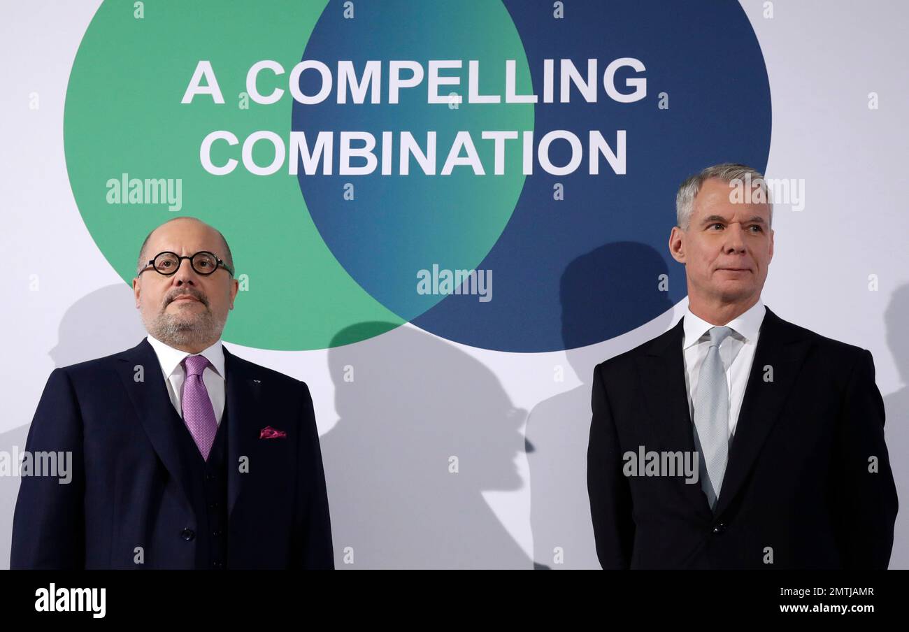 Linde CEO Aldo Belloni, left, and Praxair CEO Steve Angel pose for a ...