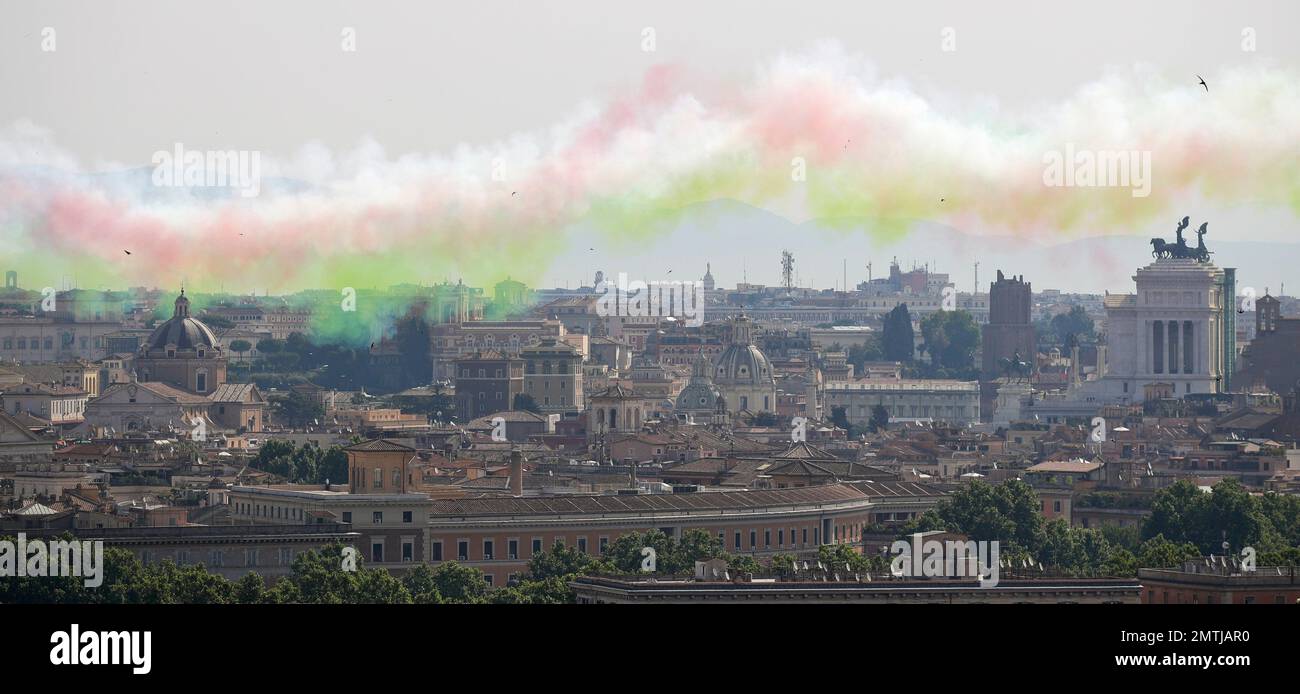 Smoke in the colors of the Italian flag is left behind after the flying ...