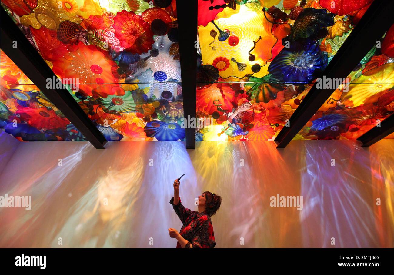 FILE - In this May 17, 2012 file photo, Kay Solberg takes photos of the ...