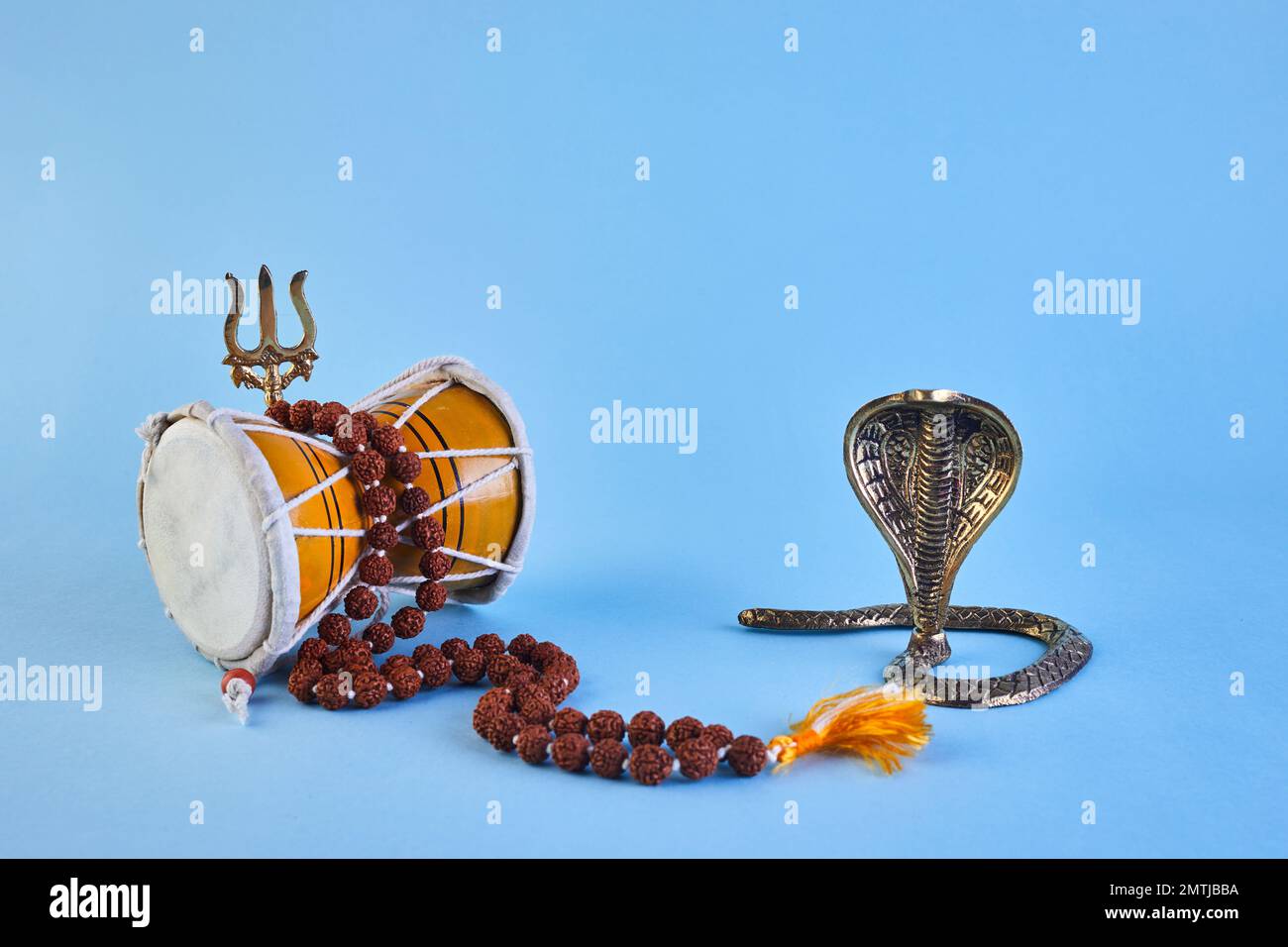 Shivaratri background with Shivas trident, Pellet Drum Damroo musical ...