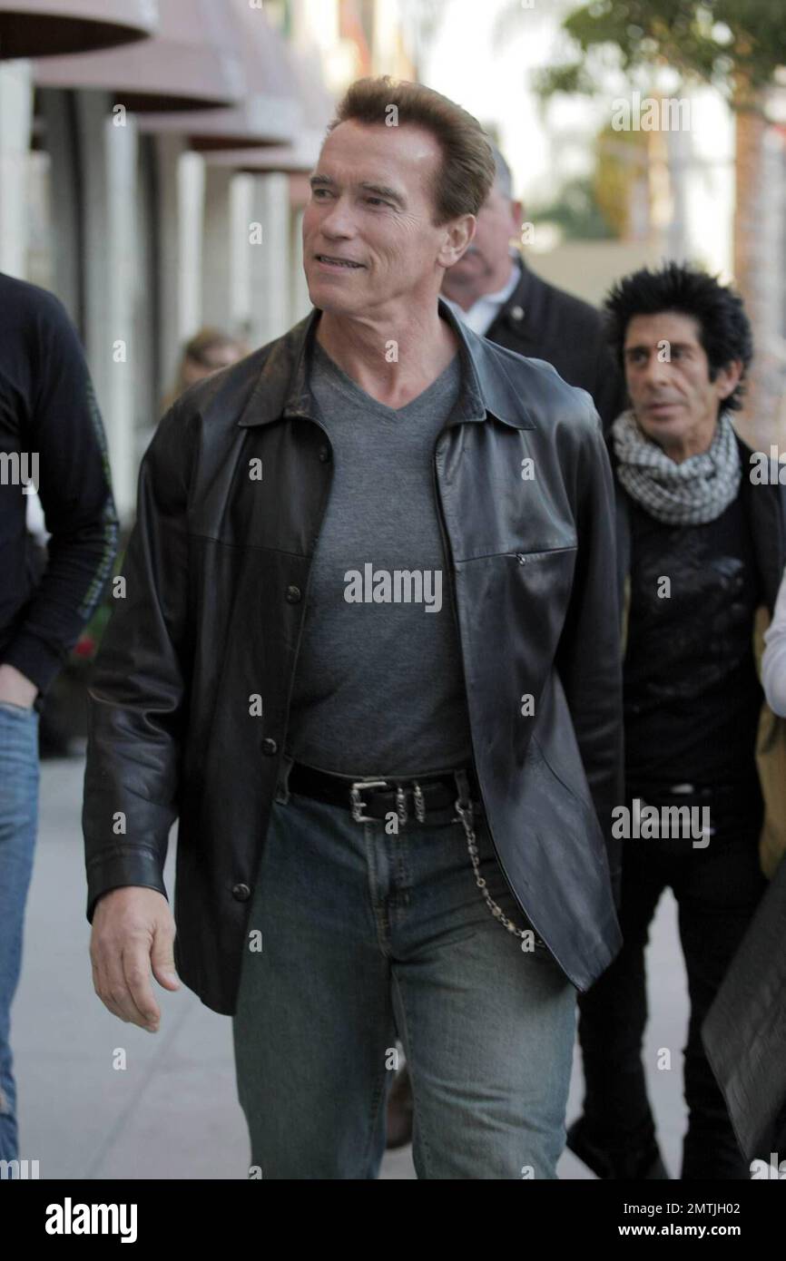 California Governor Arnold Schwarzenegger walks through Beverly Hills ...