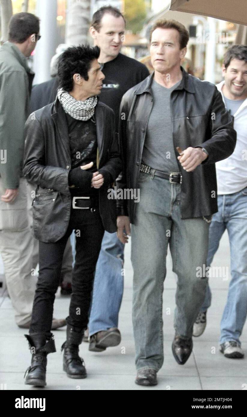 California Governor Arnold Schwarzenegger walks through Beverly Hills ...