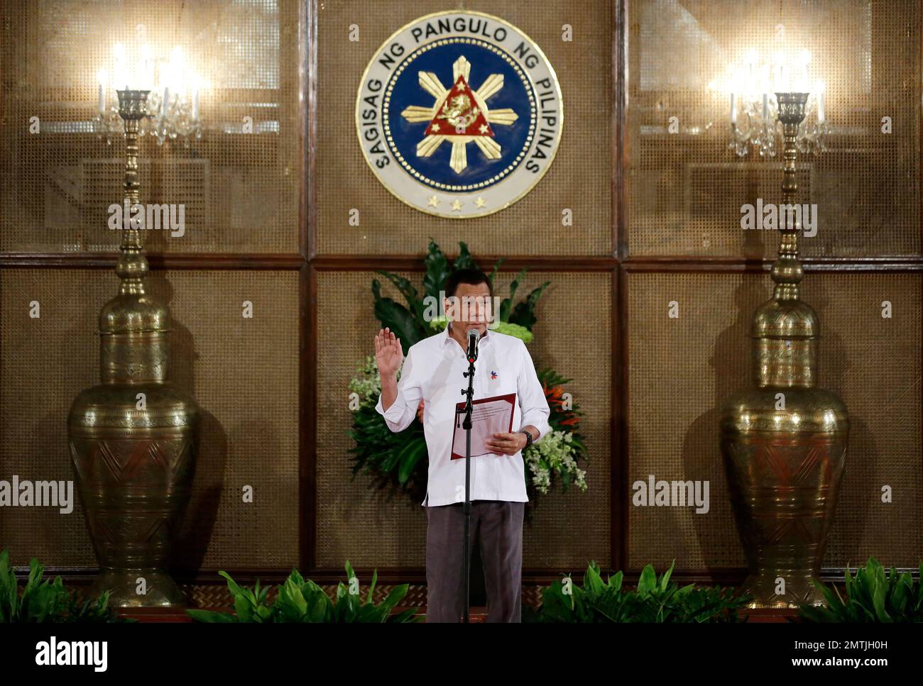 Philippine President Rodrigo Duterte officiates the oath taking of ...