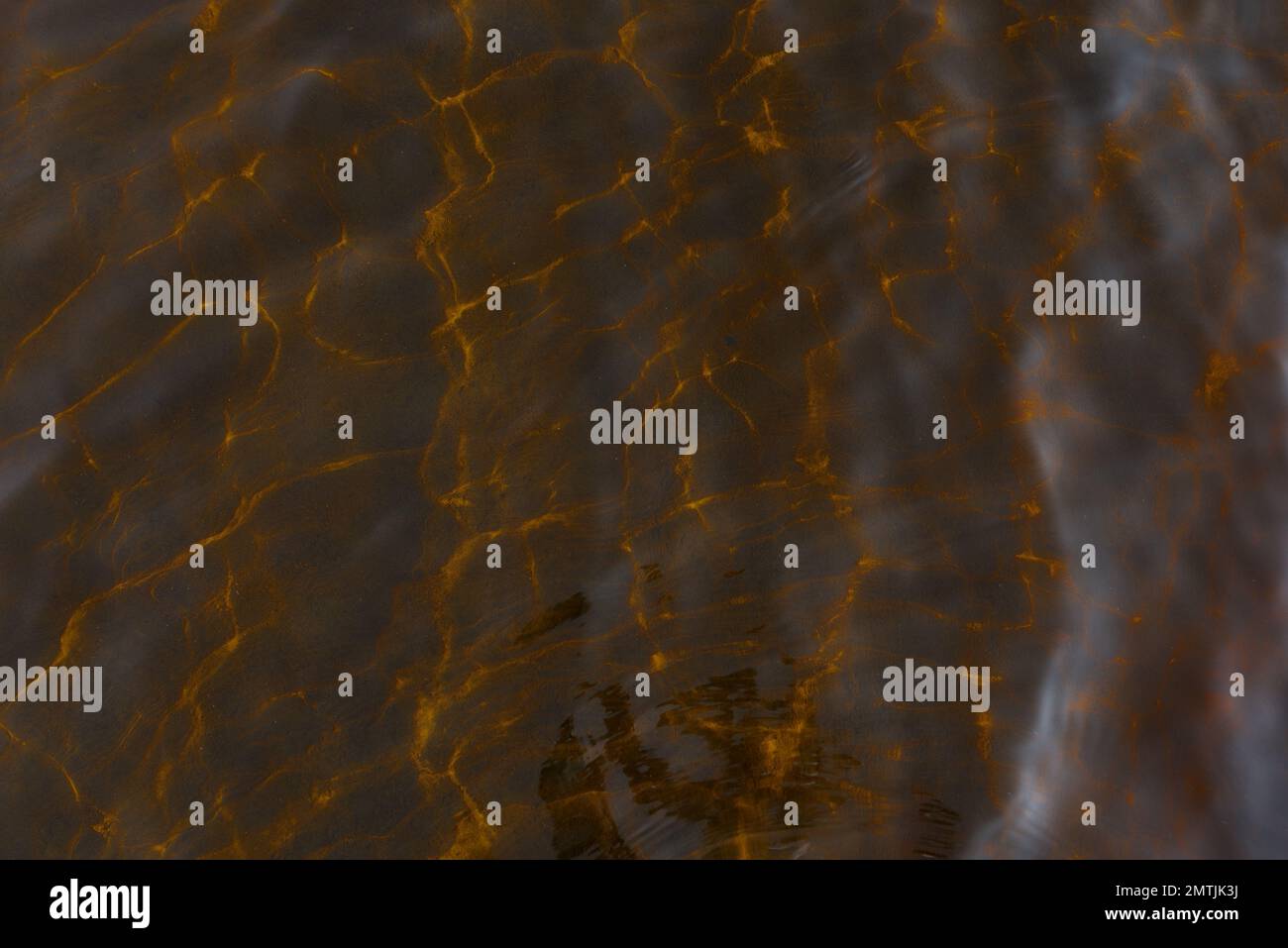 Abstract photo of the texture of the reflection of light from the ...