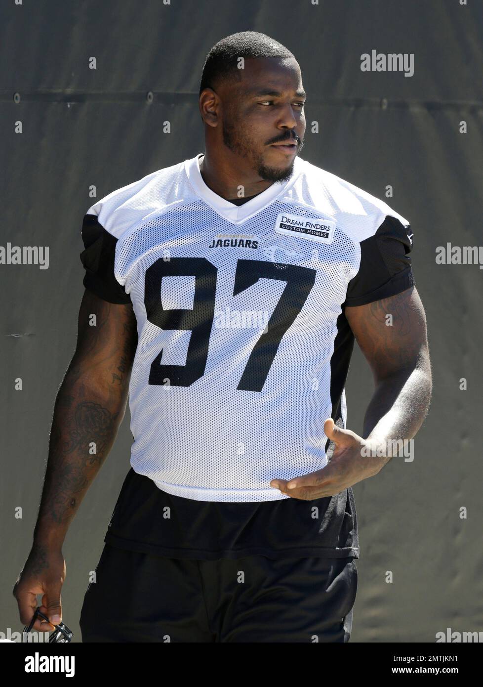 Jacksonville Jaguars defensive lineman Malik Jackson (97) walks to the ...
