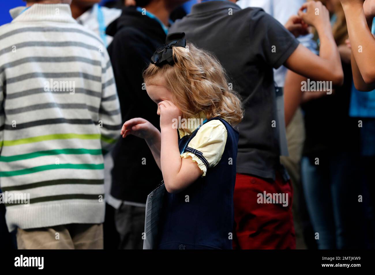 Edith Fuller, 6, from Tulsa, Okla., wipes her tears after she didn't ...