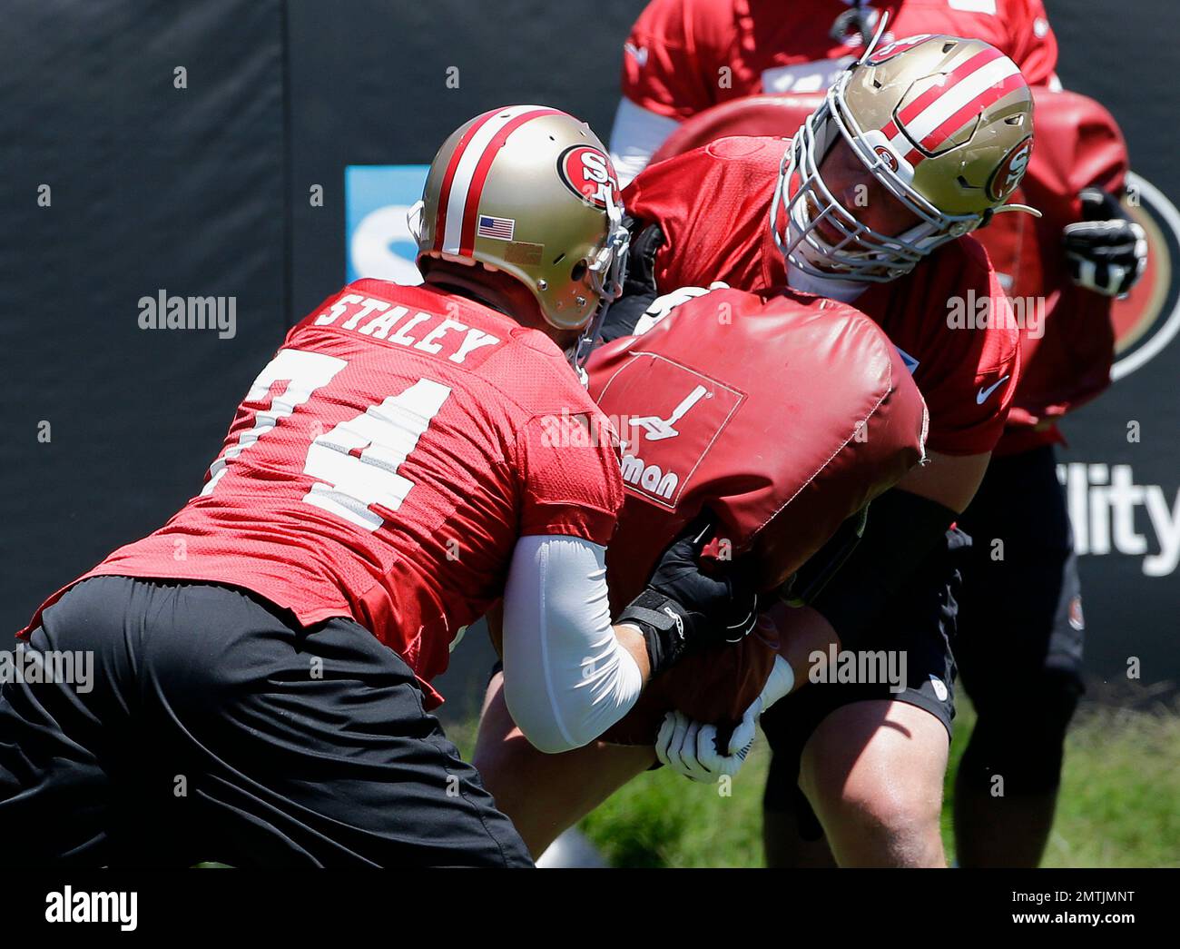 San Francisco 49ers' Joe Staley (74) and John Theus perform a drill ...