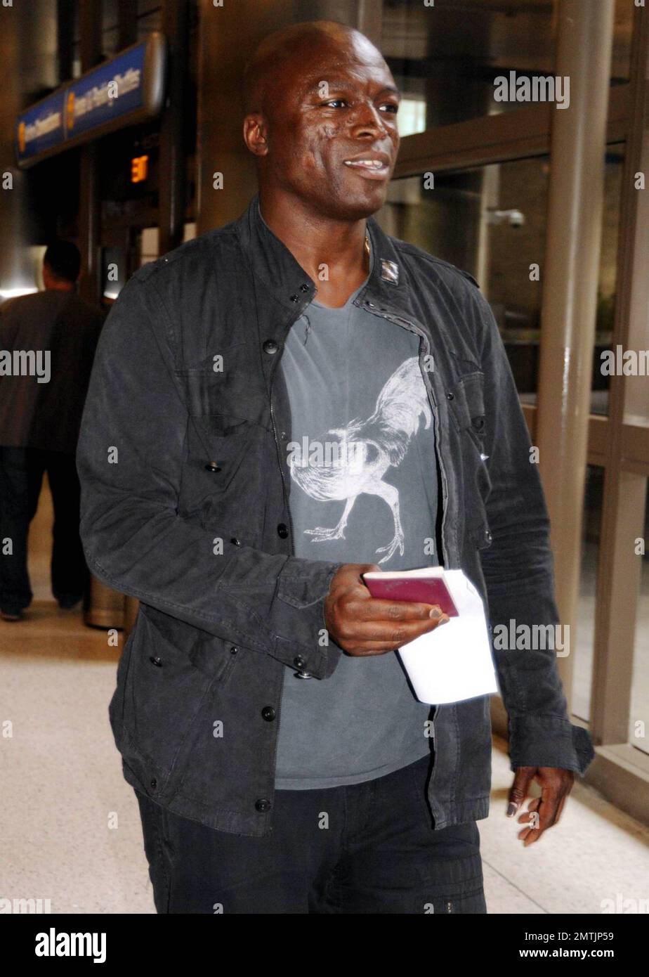 London-born musician Seal arrives at LAX from London, smiling as he ...