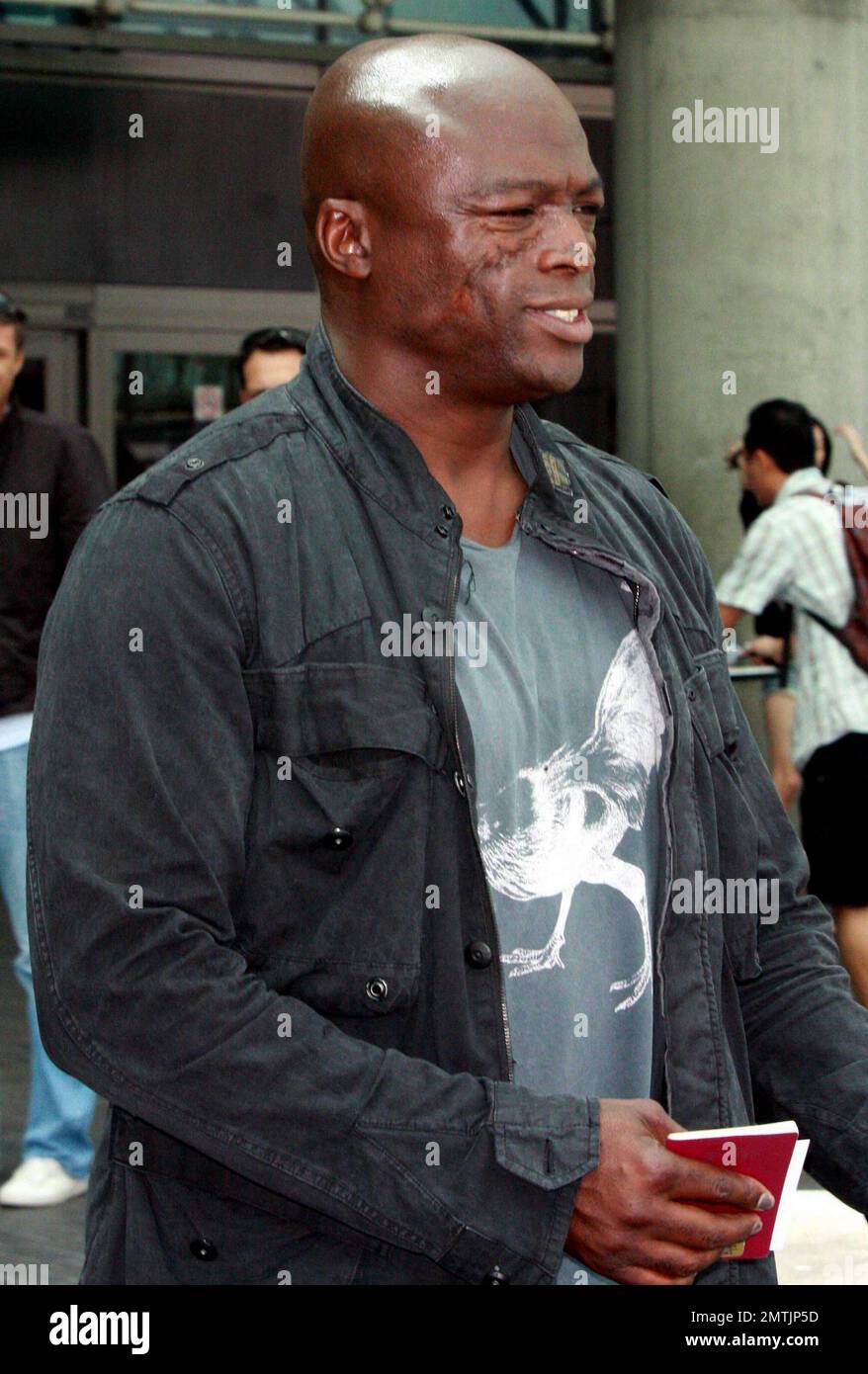 London-born musician Seal arrives at LAX from London, smiling as he ...
