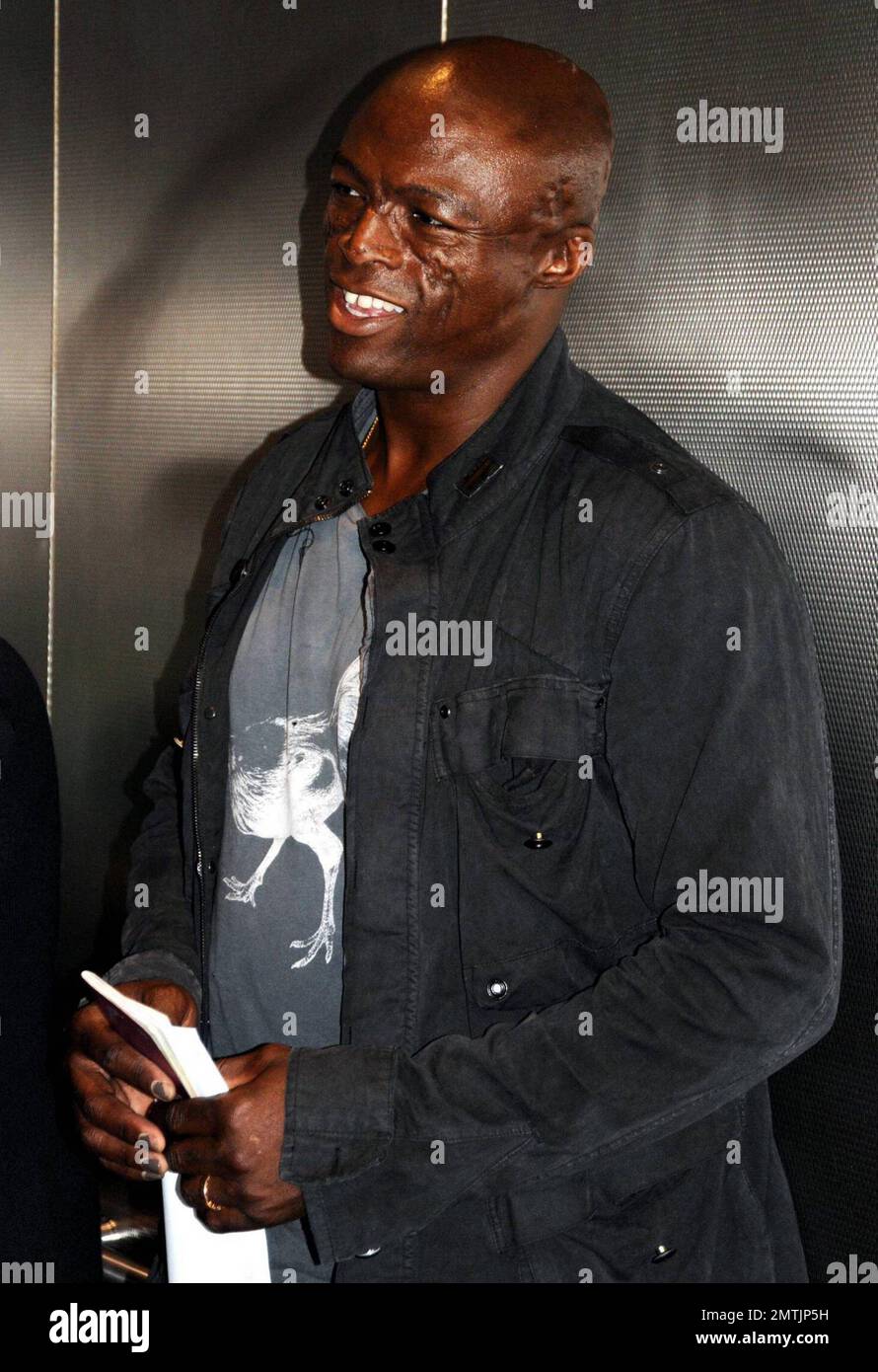 London-born musician Seal arrives at LAX from London, smiling as he ...