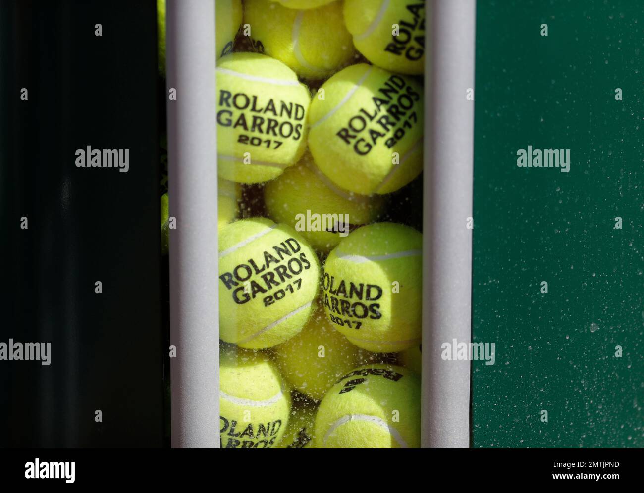 New balls sit in a dispenser box at the French Open tennis tournament ...