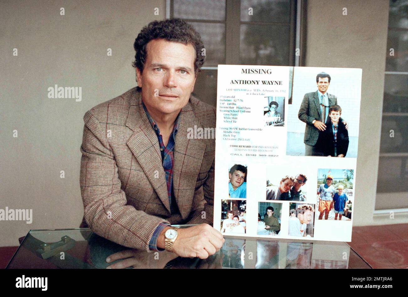 Patrick Wayne, son of the late John Wayne, poses with a poster ...