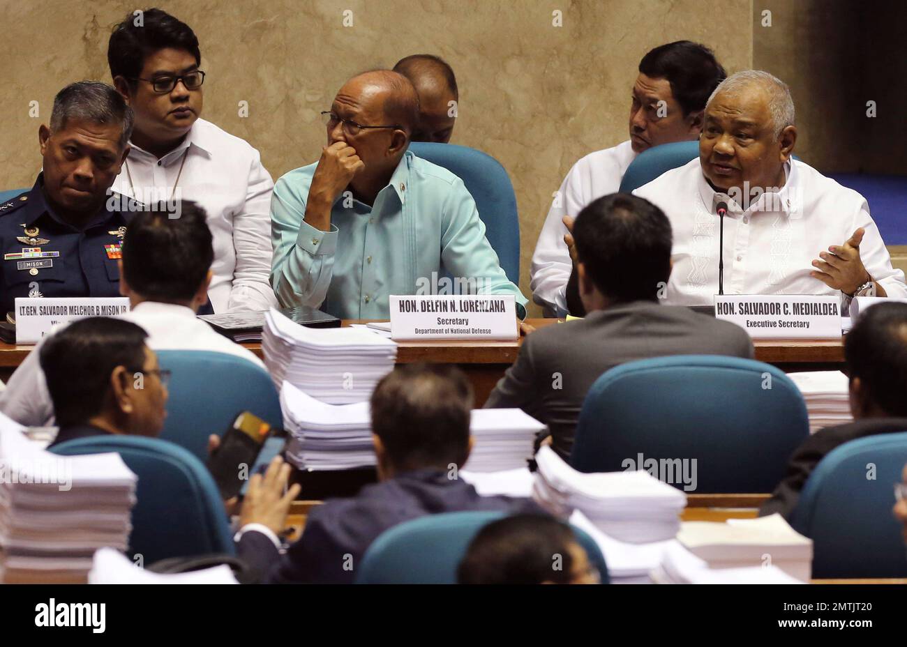 Executive Secretary Salvador Medialdea, right, delivers his speech ...