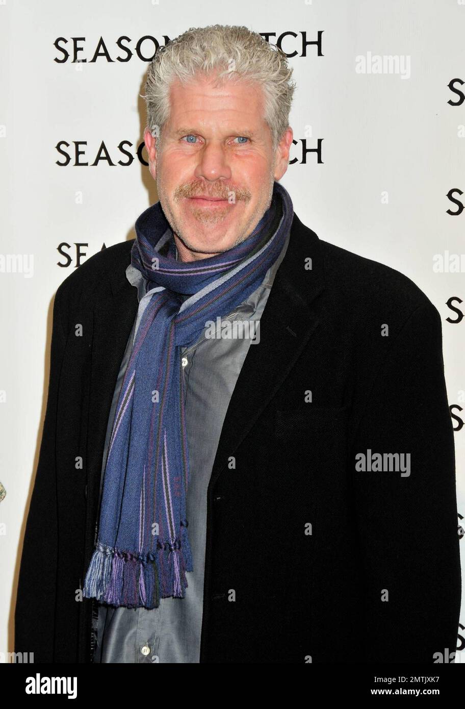 Ron Perlman poses for photographers on the red carpet at the premiere ...