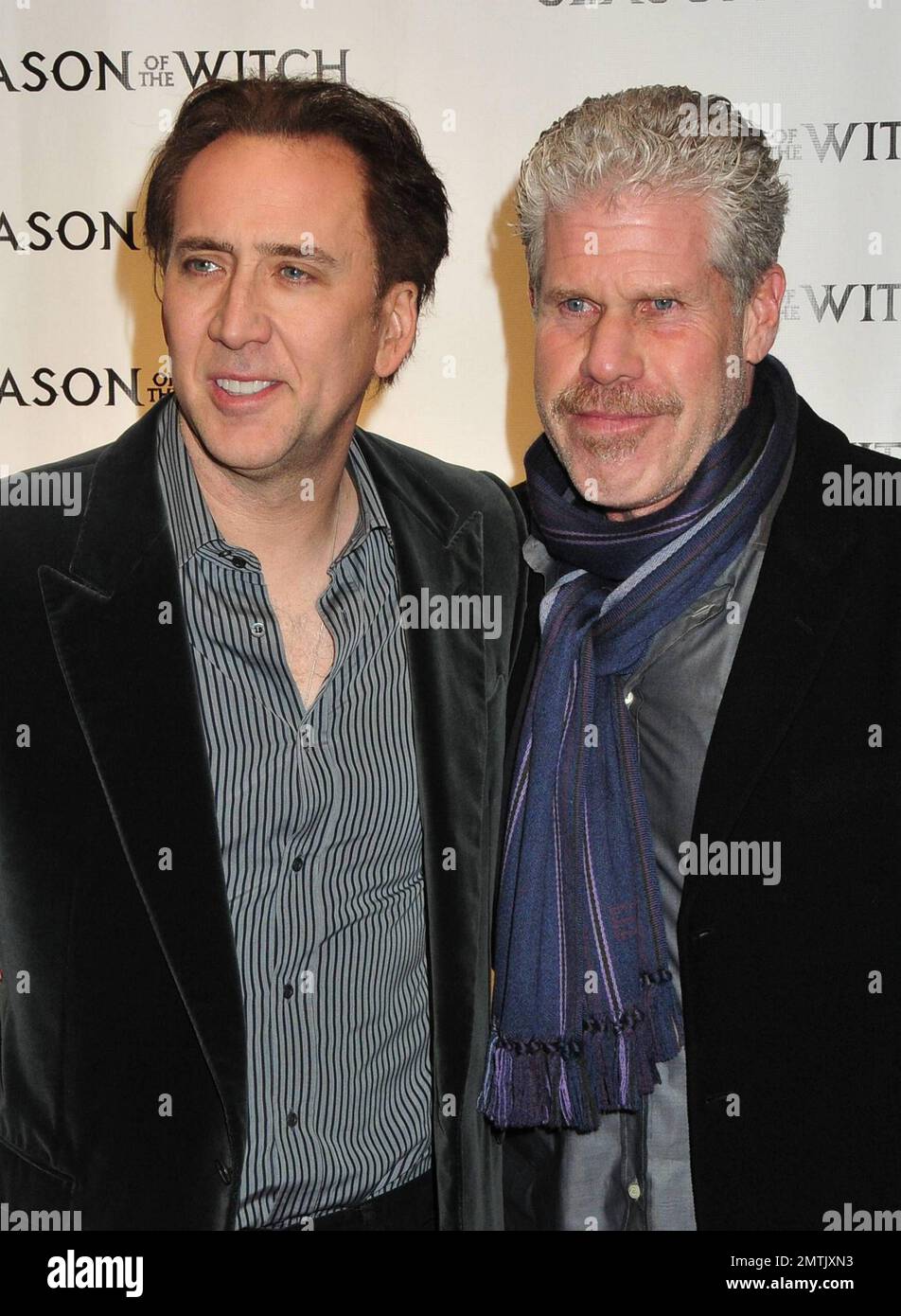 Nicolas Cage and Ron Perlman pose for photographers on the red carpet ...