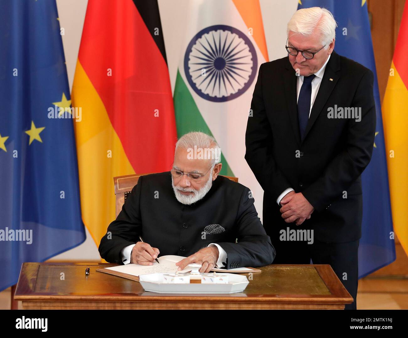 German President Frank-Walter Steinmeier, right, looks on as the Prime ...