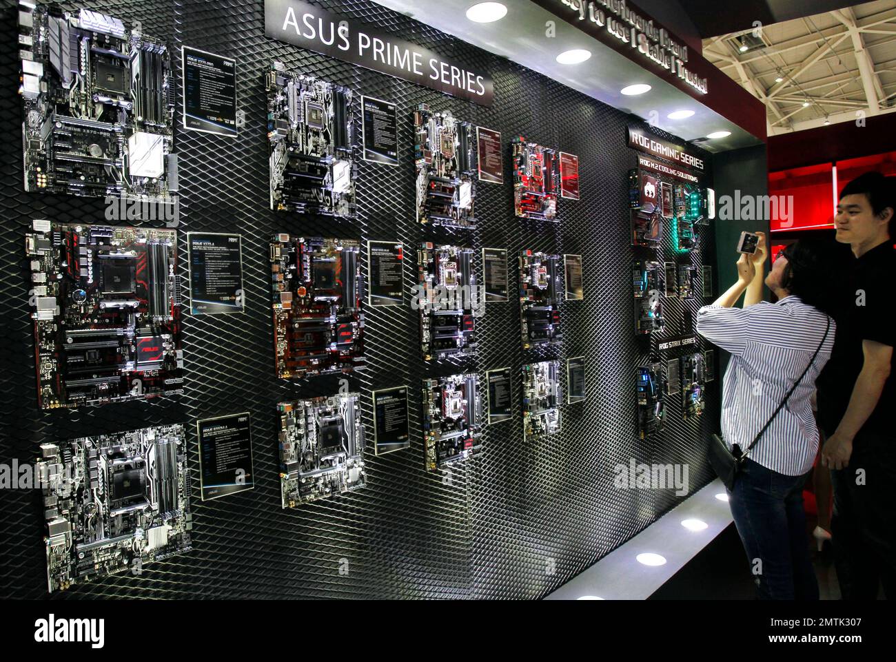 Visitors review new computer products during the Computex Taipei ...
