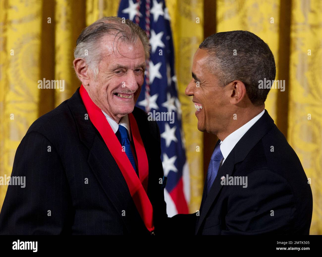 FILE - In this July 10, 2013, file photo, President Barack Obama laughs ...