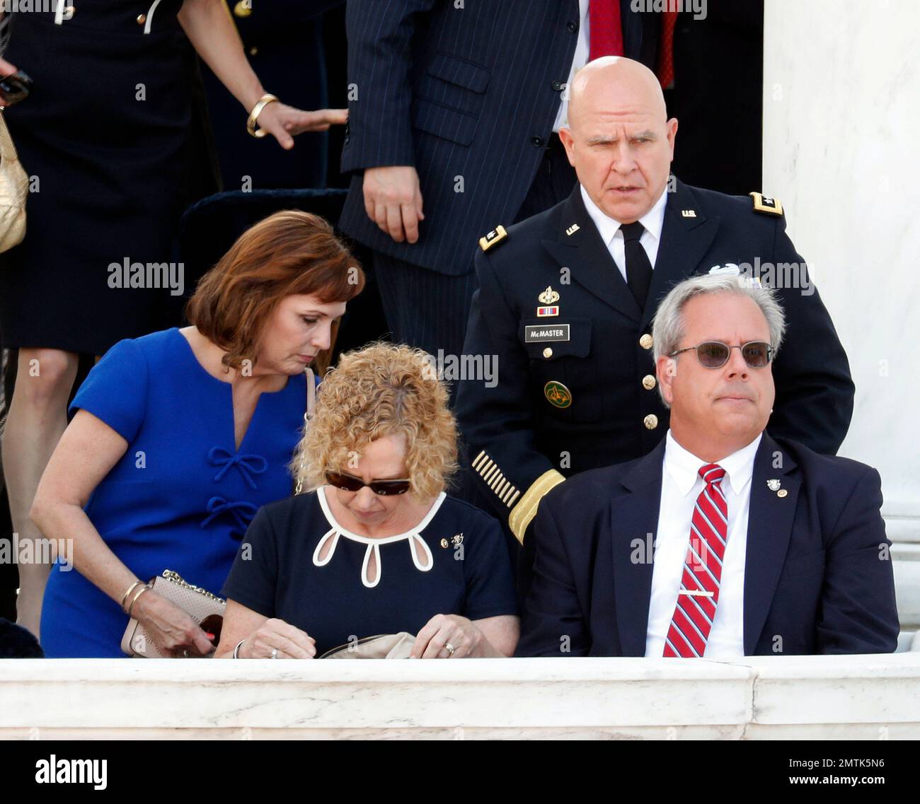 National Security Adviser H.R. McMaster, top right, takes his seat at ...