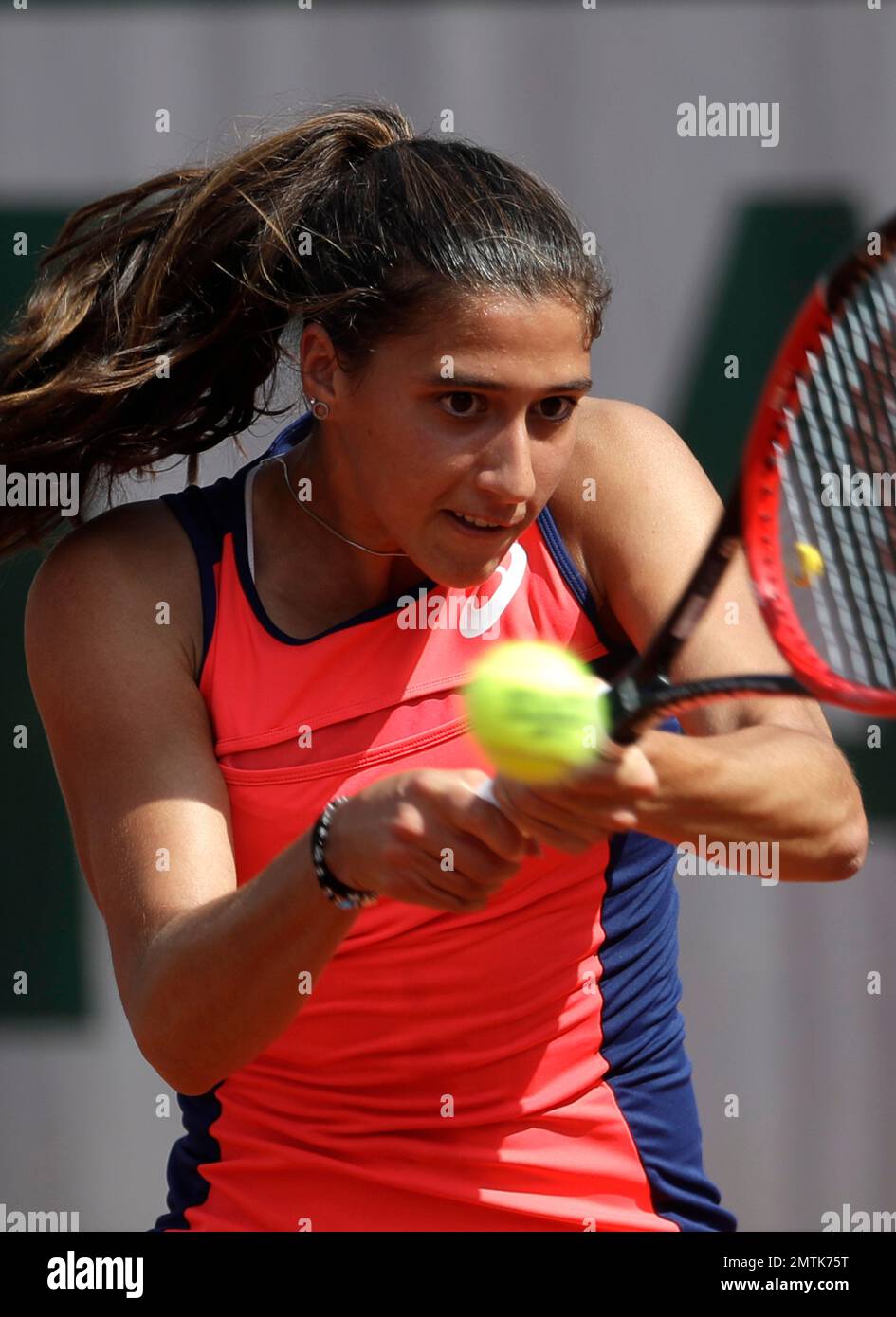 Australia's Jaimee Fourlis backhands to Denmark's Caroline Wozniacki ...