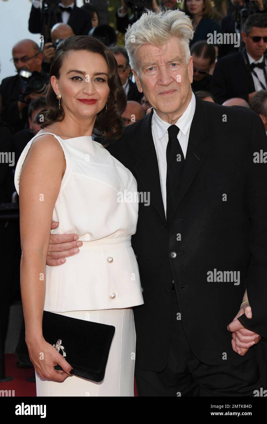 Director David Lynch, right, and Emily Stofle pose for photographers ...
