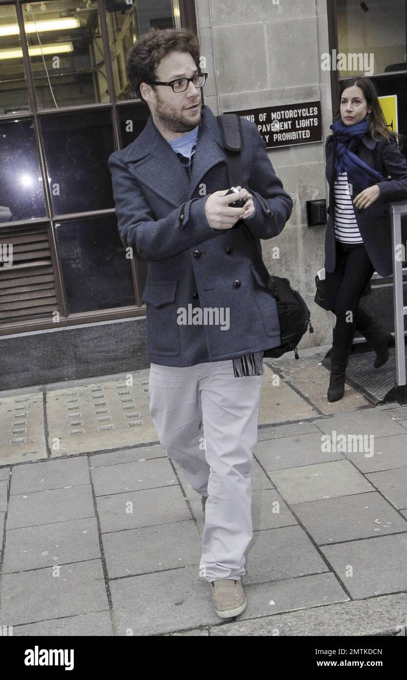 Seth Rogen makes some funny faces as he leaves BBC Radio 1 after an ...