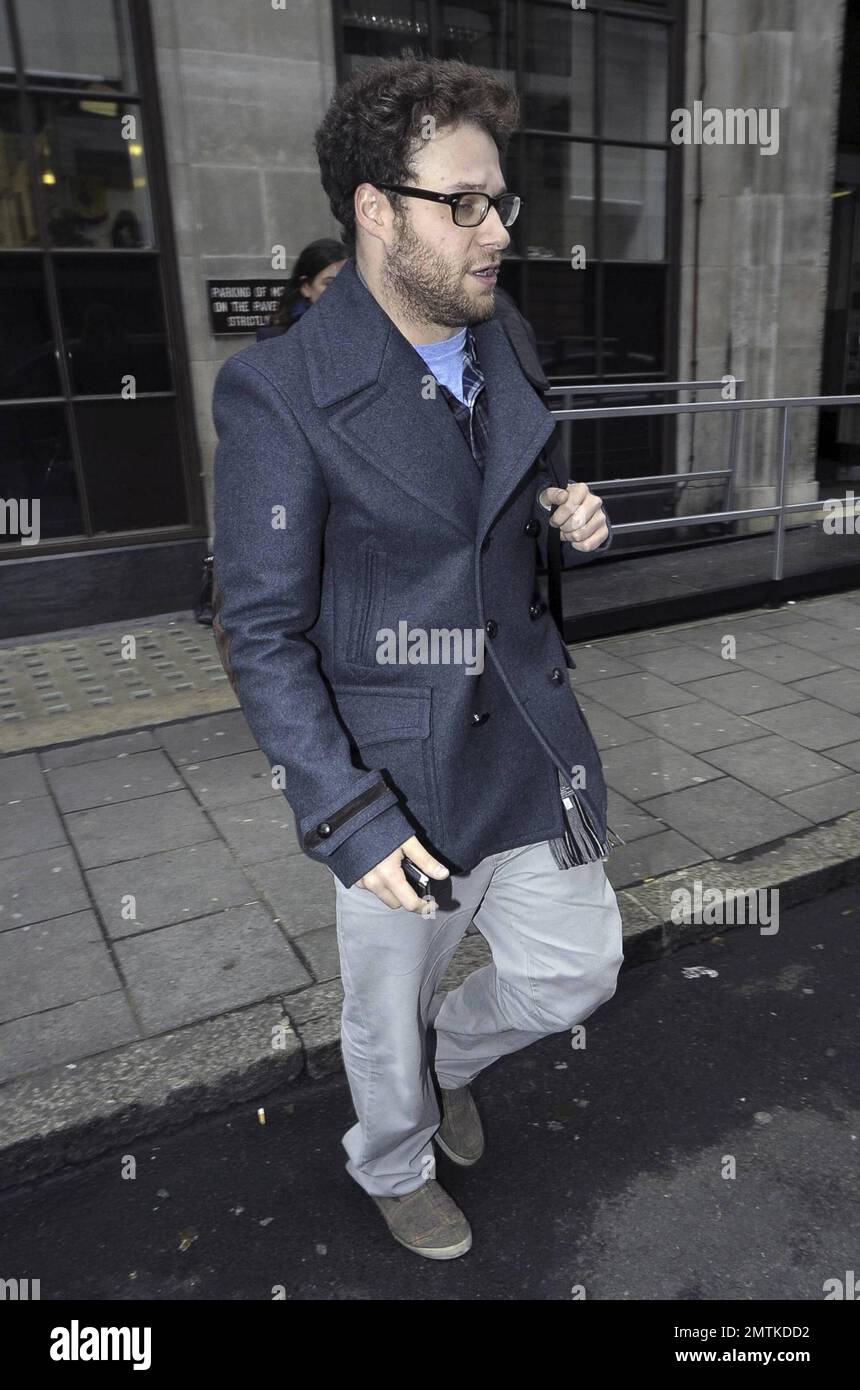 Seth Rogen makes some funny faces as he leaves BBC Radio 1 after an ...